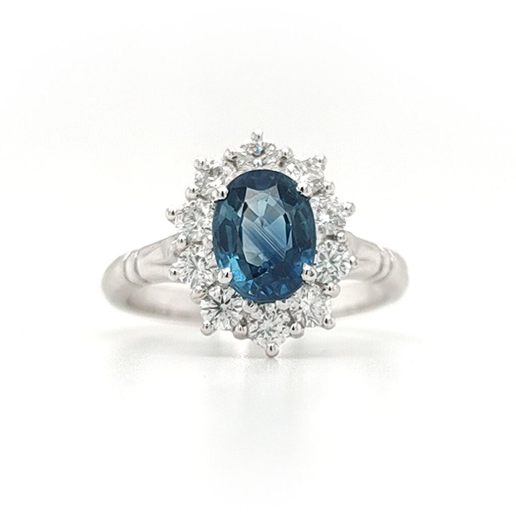 Halo Light Blue Oval Sapphire Ring - OROGEM Jewelers